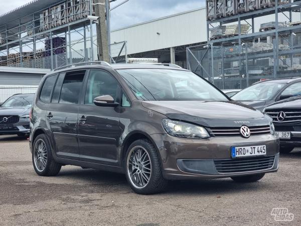 Brown Volkswagen Touran 2011 in Kaunas, with an engine capacity of 1.40 L and mileage of 252 thousand km for 4500 €, photo 4 on AUTOMOTO.COM.LV