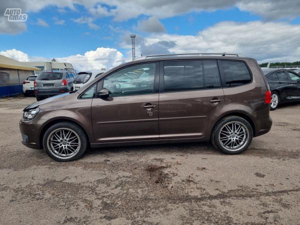 Brown Volkswagen Touran 2011 in Kaunas, with an engine capacity of 1.40 L and mileage of 252 thousand km for 4500 €, photo 7 on AUTOMOTO.COM.LV