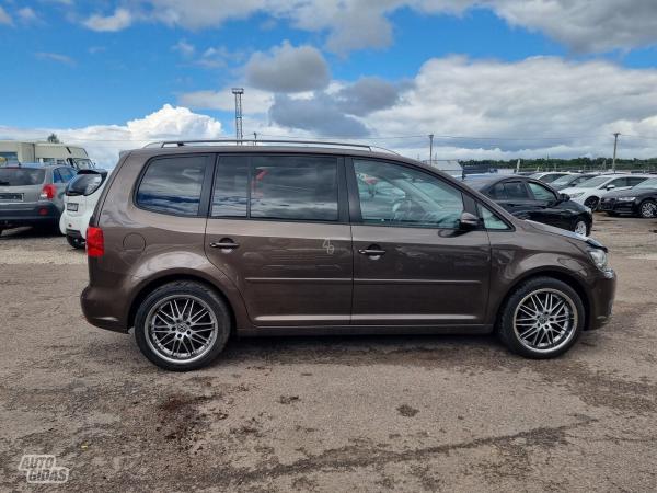 Brown Volkswagen Touran 2011 in Kaunas, with an engine capacity of 1.40 L and mileage of 252 thousand km for 4500 €, photo 8 on AUTOMOTO.COM.LV
