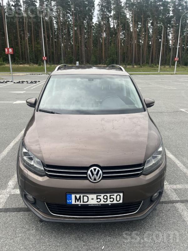 Brūns Volkswagen Touran 2011 Rīga, ar dzinēja tilpumu 2.00 L un nobraukumu 410 tūkst. km par 6500 €, foto 2 vietnē AUTOMOTO.COM.LV