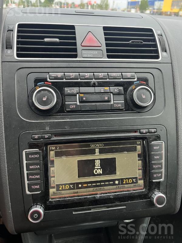 Brūns Volkswagen Touran 2011 Rīga, ar dzinēja tilpumu 2.00 L un nobraukumu 410 tūkst. km par 6500 €, foto 6 vietnē AUTOMOTO.COM.LV