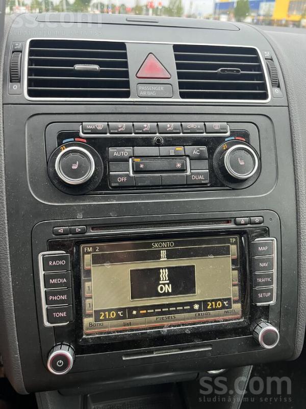 Brūns Volkswagen Touran 2011 Rīga, ar dzinēja tilpumu 2.00 L un nobraukumu 409 tūkst. km par 6000 €, foto 3 vietnē AUTOMOTO.COM.LV