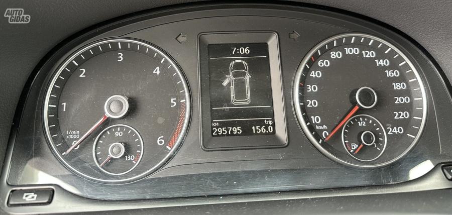 Brown Volkswagen Touran 2011 in Telschi, with an engine capacity of 2.00 L and mileage of 296 thousand km for 6900 €, photo 11 on AUTOMOTO.COM.LV