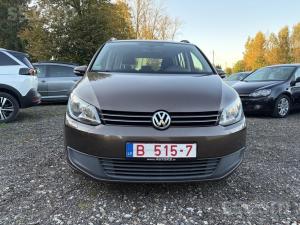 Brown Volkswagen Touran 2011 in Limbazi, with an engine capacity of 1.40 L and mileage of 280 thousand km for 5750 €, photo 3 on AUTOMOTO.COM.LV