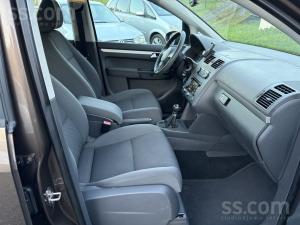 Brown Volkswagen Touran 2011 in Limbazi, with an engine capacity of 1.40 L and mileage of 280 thousand km for 5750 €, photo 12 on AUTOMOTO.COM.LV