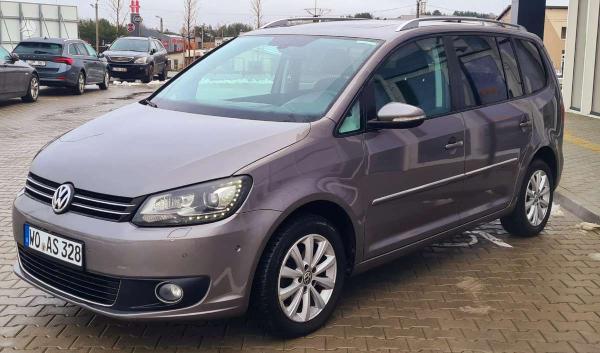Brown Volkswagen Touran 2012 in Vilnius, with an engine capacity of 1.39 L and mileage of 236 thousand km for 6350 €, photo 5 on AUTOMOTO.COM.LV