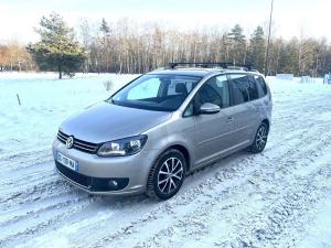Brown Volkswagen Touran 2012 in Kaunas, with an engine capacity of 1.60 L and mileage of 275 thousand km for 5850 €, photo 3 on AUTOMOTO.COM.LV