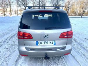 Brown Volkswagen Touran 2012 in Kaunas, with an engine capacity of 1.60 L and mileage of 275 thousand km for 5850 €, photo 6 on AUTOMOTO.COM.LV