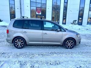 Brown Volkswagen Touran 2012 in Kaunas, with an engine capacity of 1.60 L and mileage of 275 thousand km for 5850 €, photo 8 on AUTOMOTO.COM.LV
