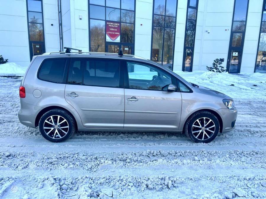 Brown Volkswagen Touran 2012 in Kaunas, with an engine capacity of 1.60 L and mileage of 275 thousand km for 5850 €, photo 8 on AUTOMOTO.COM.LV