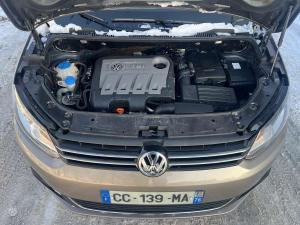 Brown Volkswagen Touran 2012 in Kaunas, with an engine capacity of 1.60 L and mileage of 275 thousand km for 5850 €, photo 25 on AUTOMOTO.COM.LV