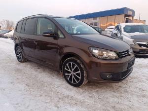 Brown Volkswagen Touran 2012 in Kretinga, with an engine capacity of 1.39 L and mileage of 183 thousand km for 6650 €, photo 2 on AUTOMOTO.COM.LV