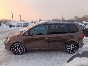 Brown Volkswagen Touran 2012 in Kretinga, with an engine capacity of 1.39 L and mileage of 183 thousand km for 6650 €, photo 7 on AUTOMOTO.COM.LV