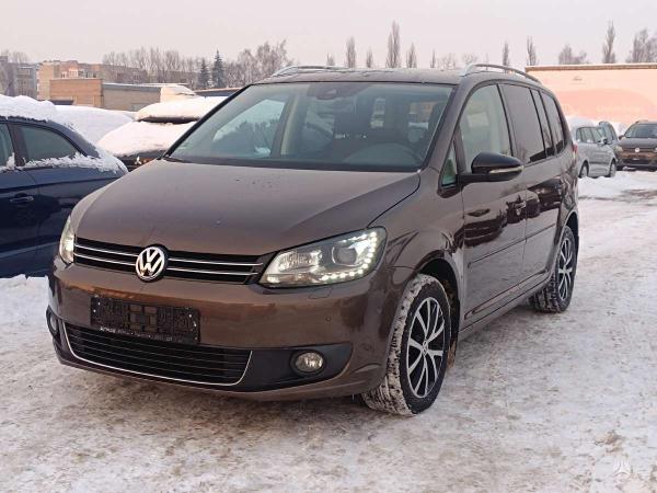Brown Volkswagen Touran 2012 in Kretinga, with an engine capacity of 1.39 L and mileage of 183 thousand km for 6650 €, photo 8 on AUTOMOTO.COM.LV