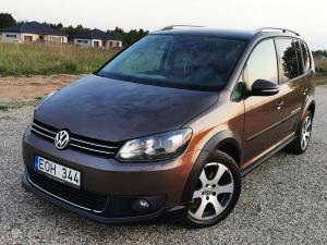 Brown Volkswagen Touran 2012 in Vilnius, with an engine capacity of 1.97 L and mileage of 300 thousand km for 5350 €, photo  on AUTOMOTO.COM.LV