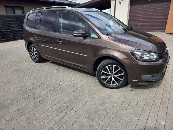 Brown Volkswagen Touran 2012 in Kaisiadorys, with an engine capacity of 1.97 L and mileage of 241 thousand km for 5650 €, photo 7 on AUTOMOTO.COM.LV