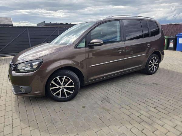 Brown Volkswagen Touran 2012 in Kaisiadorys, with an engine capacity of 1.97 L and mileage of 241 thousand km for 5650 €, photo 8 on AUTOMOTO.COM.LV
