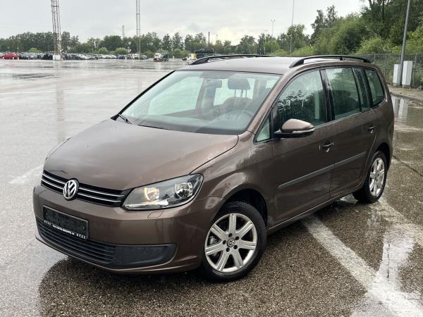 Brown Volkswagen Touran 2012 in Marijampole, with an engine capacity of 1.20 L and mileage of 202 thousand km for 4850 €, photo 1 on AUTOMOTO.COM.LV