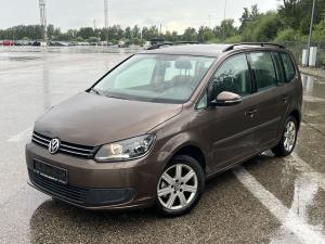 Brown Volkswagen Touran 2012 in Marijampole, with an engine capacity of 1.20 L and mileage of 202 thousand km for 4850 €, photo  on AUTOMOTO.COM.LV
