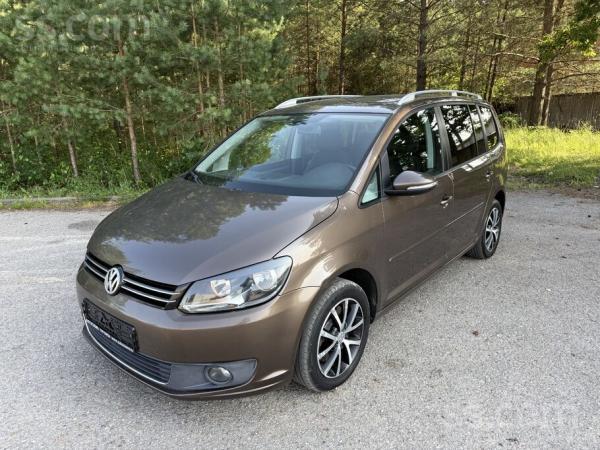 Brūns Volkswagen Touran 2012 Ogre, ar dzinēja tilpumu 2.00 L un nobraukumu 239 tūkst. km par 7999 €, foto 3 vietnē AUTOMOTO.COM.LV