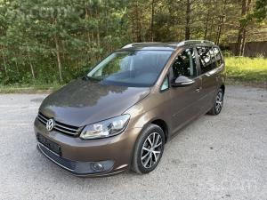 Brūns Volkswagen Touran 2012 Ogre, ar dzinēja tilpumu 2.00 L un nobraukumu 239 tūkst. km par 7999 €, foto 4 vietnē AUTOMOTO.COM.LV