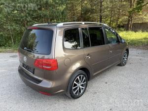 Brūns Volkswagen Touran 2012 Ogre, ar dzinēja tilpumu 2.00 L un nobraukumu 239 tūkst. km par 7999 €, foto 6 vietnē AUTOMOTO.COM.LV