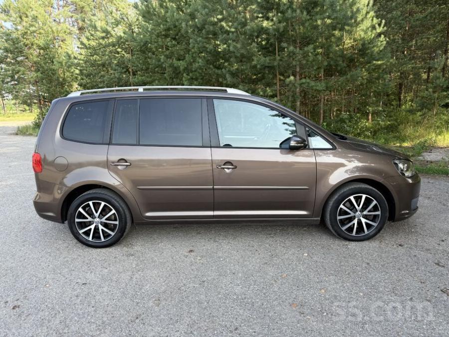 Brūns Volkswagen Touran 2012 Ogre, ar dzinēja tilpumu 2.00 L un nobraukumu 239 tūkst. km par 7999 €, foto 7 vietnē AUTOMOTO.COM.LV