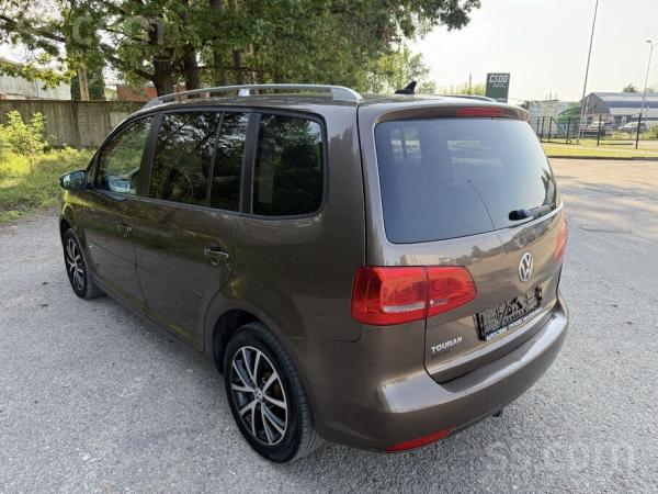 Brūns Volkswagen Touran 2012 Ogre, ar dzinēja tilpumu 2.00 L un nobraukumu 239 tūkst. km par 7999 €, foto 8 vietnē AUTOMOTO.COM.LV