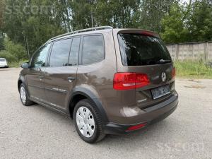Brown Volkswagen Touran 2012 in Riga, with an engine capacity of 2.00 L and mileage of 280 thousand km for 7180 €, photo 5 on AUTOMOTO.COM.LV
