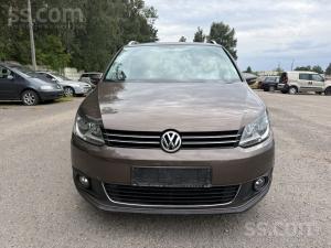Brown Volkswagen Touran 2012 in Riga, with an engine capacity of 2.00 L and mileage of 280 thousand km for 7180 €, photo 6 on AUTOMOTO.COM.LV