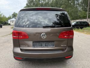 Brown Volkswagen Touran 2012 in Riga, with an engine capacity of 2.00 L and mileage of 280 thousand km for 7180 €, photo 7 on AUTOMOTO.COM.LV