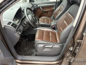 Brown Volkswagen Touran 2012 in Riga, with an engine capacity of 2.00 L and mileage of 280 thousand km for 7180 €, photo 10 on AUTOMOTO.COM.LV