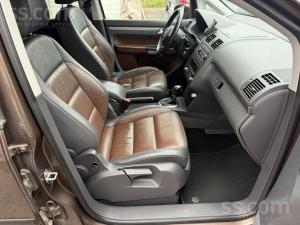 Brown Volkswagen Touran 2012 in Riga, with an engine capacity of 2.00 L and mileage of 280 thousand km for 7180 €, photo 12 on AUTOMOTO.COM.LV