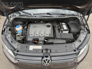 Brown Volkswagen Touran 2012 in Riga, with an engine capacity of 2.00 L and mileage of 280 thousand km for 7180 €, photo 17 on AUTOMOTO.COM.LV