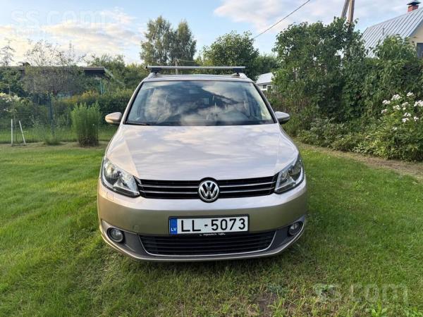 Brūns Volkswagen Touran 2012 Rīga, ar dzinēja tilpumu 2.00 L un nobraukumu 300 tūkst. km par 5800 €, foto 2 vietnē AUTOMOTO.COM.LV
