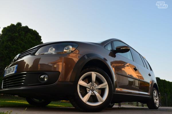 Brown Volkswagen Touran 2012 in Kaunas, with an engine capacity of 2.00 L and mileage of 185 thousand km for 6950 €, photo 5 on AUTOMOTO.COM.LV