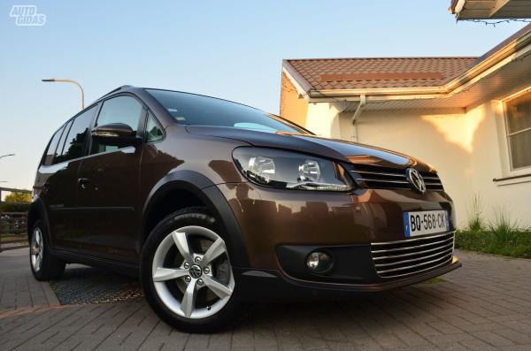 Brown Volkswagen Touran 2012 in Kaunas, with an engine capacity of 2.00 L and mileage of 185 thousand km for 6950 €, photo 10 on AUTOMOTO.COM.LV