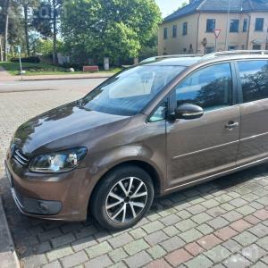 Brown Volkswagen Touran 2012 in Ventspils, with an engine capacity of 1.60 L and mileage of 238 thousand km for 5650 €, photo  on AUTOMOTO.COM.LV