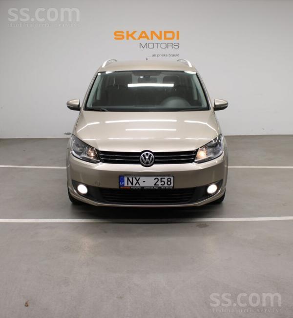 Brown Volkswagen Touran 2013 in Riga, with an engine capacity of 1.60 L and mileage of 274 thousand km for 8190 €, photo 2 on AUTOMOTO.COM.LV