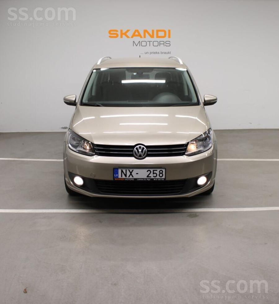 Brown Volkswagen Touran 2013 in Riga, with an engine capacity of 1.60 L and mileage of 274 thousand km for 8190 €, photo 2 on AUTOMOTO.COM.LV