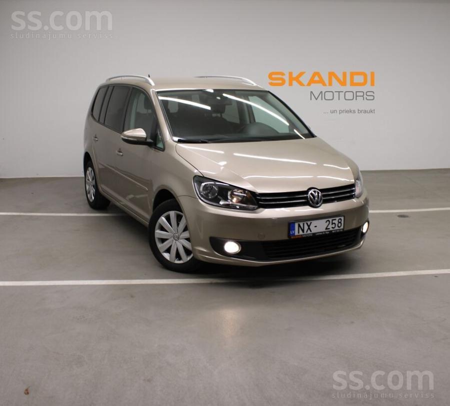 Brown Volkswagen Touran 2013 in Riga, with an engine capacity of 1.60 L and mileage of 274 thousand km for 8190 €, photo 3 on AUTOMOTO.COM.LV
