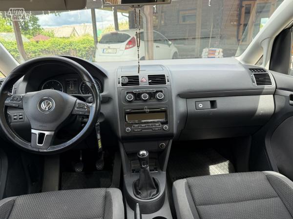 Brown Volkswagen Touran 2013 in Kaunas, with an engine capacity of 1.60 L and mileage of 391 thousand km for 4500 €, photo 2 on AUTOMOTO.COM.LV