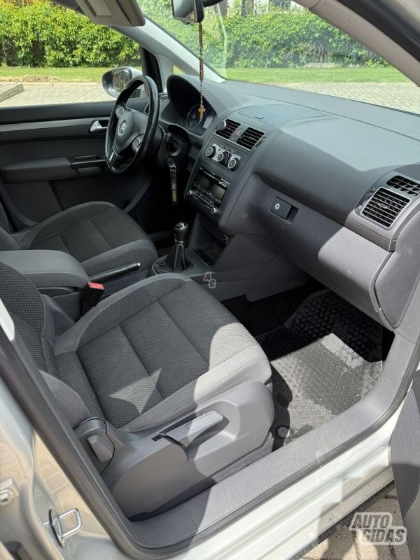 Brown Volkswagen Touran 2013 in Kaunas, with an engine capacity of 1.60 L and mileage of 391 thousand km for 4500 €, photo 5 on AUTOMOTO.COM.LV