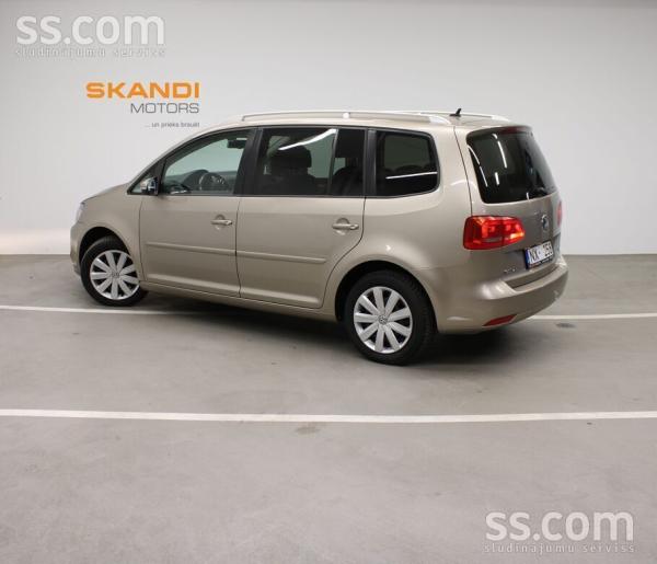 Brown Volkswagen Touran 2013 in Riga, with an engine capacity of 1.60 L and mileage of 274 thousand km for 7290 €, photo 6 on AUTOMOTO.COM.LV