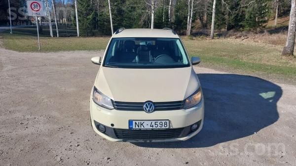 Brown Volkswagen Touran 2013 in Aluksne, with an engine capacity of 2.00 L and mileage of 0 thousand km for 2850 €, photo 4 on AUTOMOTO.COM.LV
