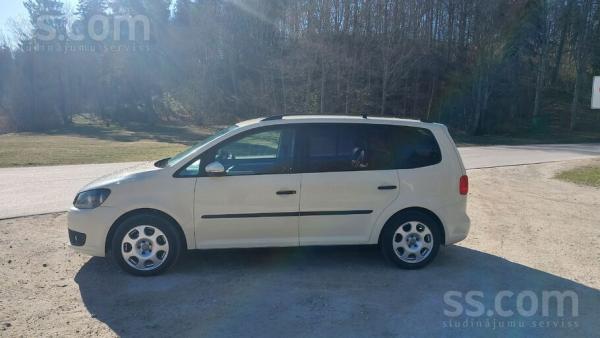 Brown Volkswagen Touran 2013 in Aluksne, with an engine capacity of 2.00 L and mileage of 0 thousand km for 2850 €, photo 9 on AUTOMOTO.COM.LV