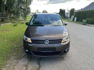 Brown Volkswagen Touran 2013 in Utena, with an engine capacity of 1.60 L and mileage of 254 thousand km for 5750 €, photo 3 on AUTOMOTO.COM.LV
