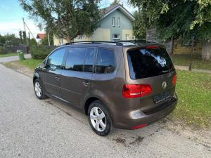 Brown Volkswagen Touran 2013 in Utena, with an engine capacity of 1.60 L and mileage of 254 thousand km for 5750 €, photo 5 on AUTOMOTO.COM.LV