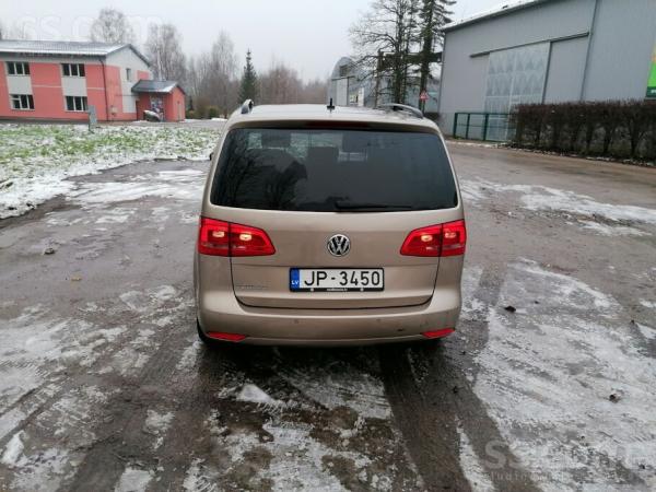 Brown Volkswagen Touran 2014 in Ogre, with an engine capacity of 1.60 L and mileage of 244 thousand km for 7999 €, photo 8 on AUTOMOTO.COM.LV