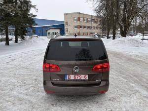 Brūns Volkswagen Touran 2014 Ogre, ar dzinēja tilpumu 1.60 L un nobraukumu 214 tūkst. km par 8450 €, foto 5 vietnē AUTOMOTO.COM.LV